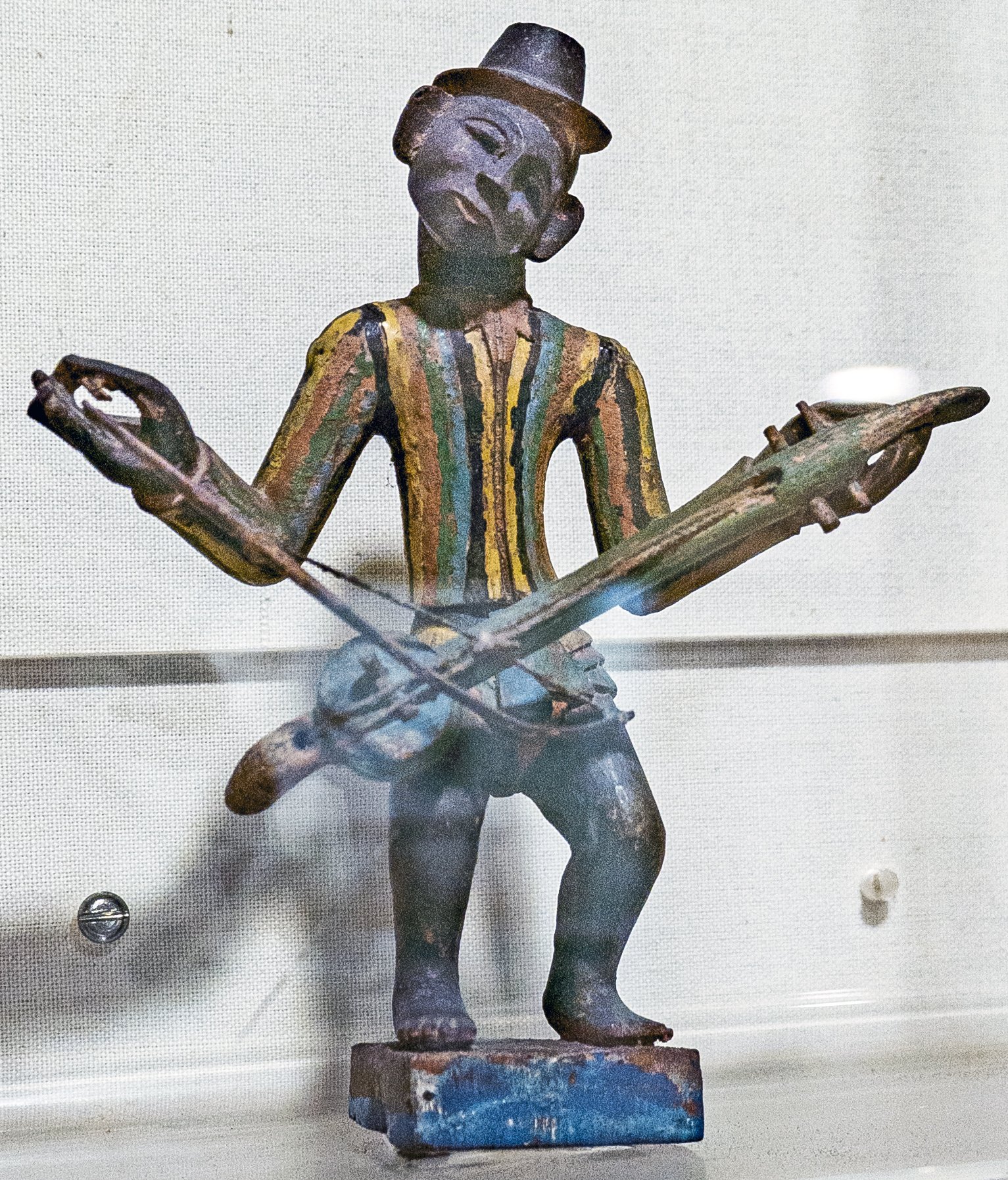 String instrument player (toy) [New Delhi Museum—Musical Instruments]